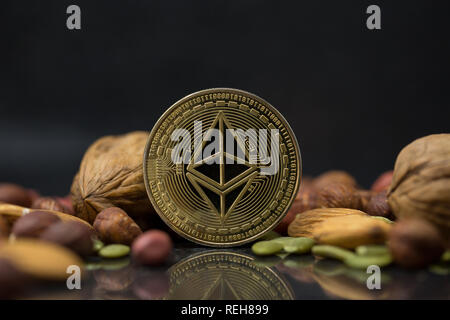 Ethereum classic physical coin surrounded with Christmas tree lights ...