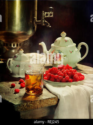 Tea from a samovar and a raspberry Stock Photo - Alamy