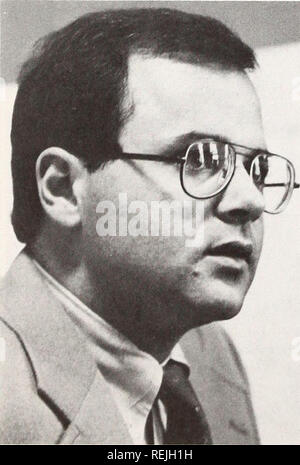 North Carolina Gov. Jim Hunt lifts his pen after signing into law the ...