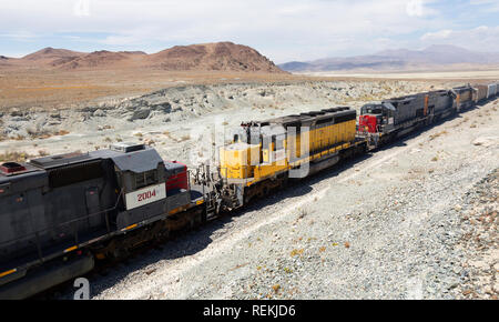 Trona Railroad moving cargo through Trona Pinnacles, California Stock ...