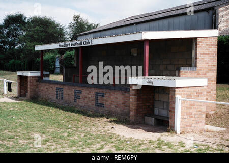 Covered area and dugouts at Mundford FC Football Ground, The Glebe, St ...