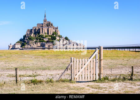 wooden bridge in a meadow, blue sky Stock Photo - Alamy