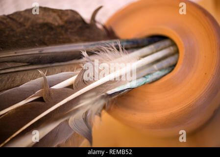 Feather pen in clay inkwell. Medieval, vintage, retro background ...