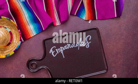 Flat lay. Writing Emapandas sign on black chalk board Stock Photo - Alamy