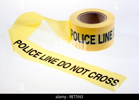 yellow police tape cordoning off a crime scene Stock Photo - Alamy