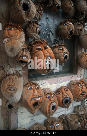 Carved coconut heads sold as souvenirs, Ubud, Bali, Indonesia Stock ...