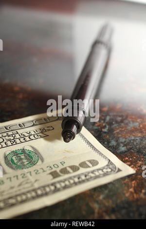Counterfeit money testing pen Stock Photo - Alamy