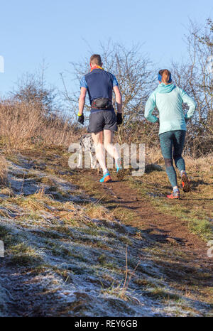 Fell Runners on the Cumbrian Fells in the English Lake District during ...