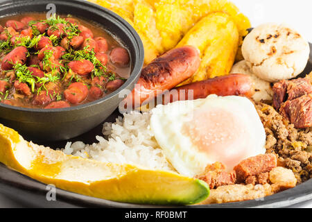 Traditional Colombian dish called Bandeja Paisa: a plate typical of ...