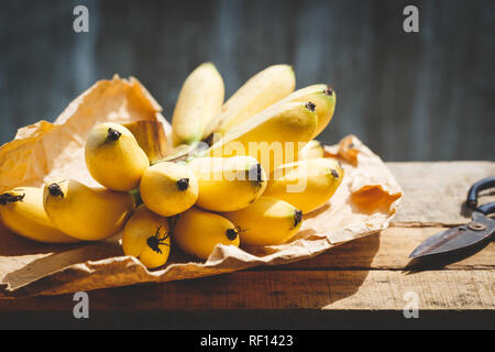Ripe little bananas Stock Photo - Alamy