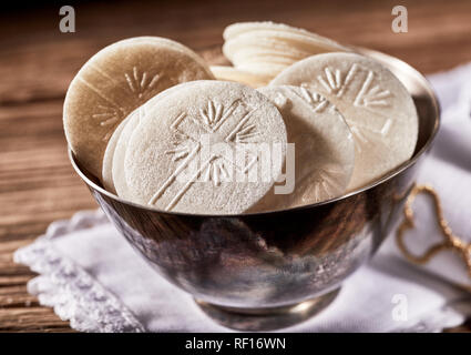 Close up detail of Hostie or consecrated Sacramental Bread for the Holy ...