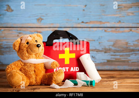Paediatric healthcare concept with a little teddy bear with its arm in ...