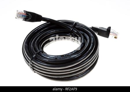 Coiled computer network cables used to connect to an internal or ...