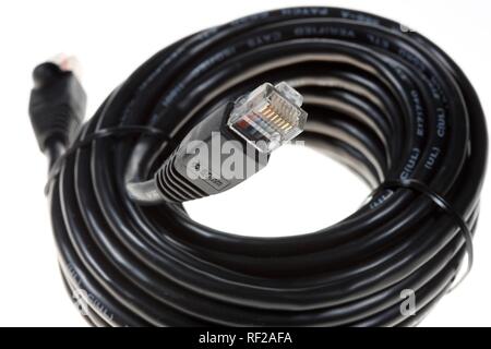 Coiled computer network cables used to connect to an internal or ...