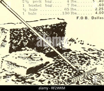 Garden cart with peat on the lawn close-up Stock Photo - Alamy