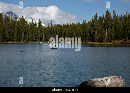Canoes on String Lake in Grand Teton National Park. Wyoming, USA, July ...