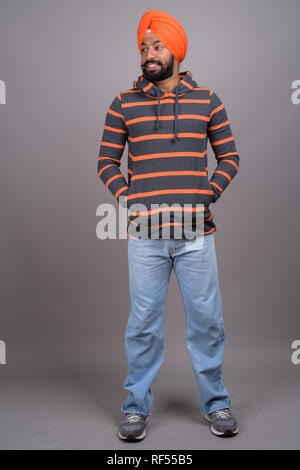 Indian guy full body studio portrait Stock Photo - Alamy