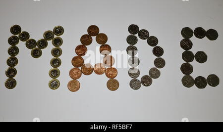 Sterling currency coinage spelling the word MADE (Made of money Stock ...