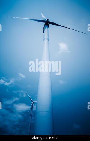 wind generators aganist the blue sky, blue toned Stock Photo - Alamy