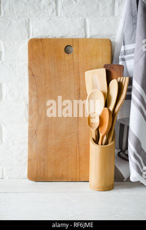 Scandinavian style kitchen utensils. Wooden cutting boards, wooden ...