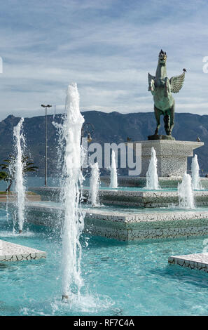 Statue of Pegasus, emblem of the city of Corinth, Greece Stock Photo ...