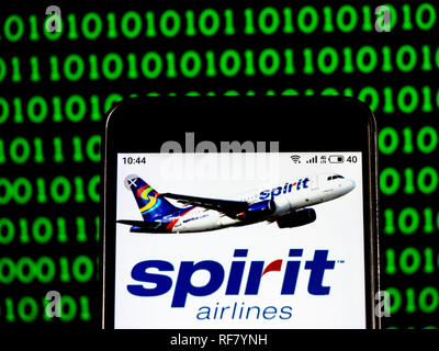 Spirit Airlines, Commercial airline logo seen displayed on smart phone ...