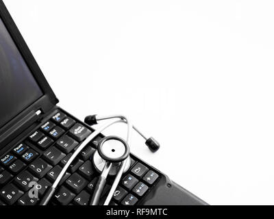 Electronic medical, stethoscope on PC/Laptop/Keyboard， blue toned ...