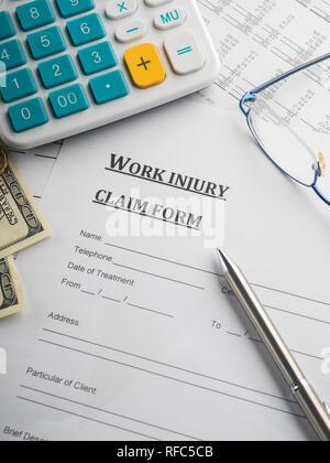 work injury claim form Stock Photo - Alamy