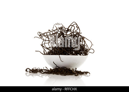 Arame. Dry seaweed in bowl isolated on white background. Healthy Sea ...