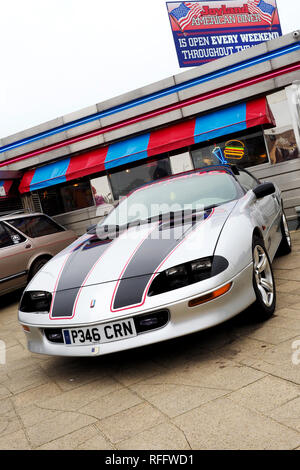 The fourth-generation Chevrolet Camaro coupe is a high-performance ...