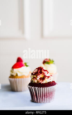 Fancy food cupcake with delicious white icing Stock Photo - Alamy