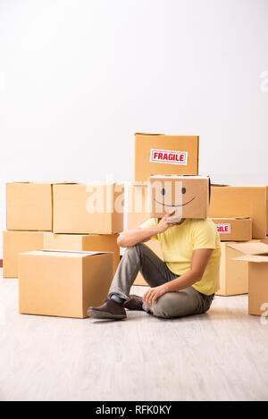 Happy man with box instead of his head Stock Photo - Alamy