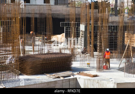 Construction worker fitting formwork for a concrete pour at Moda's new ...