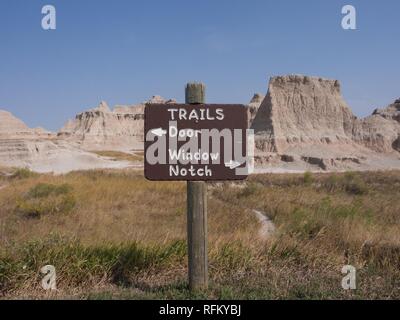 The sign for the Door, Window, and Notch Trails in Badlands National ...