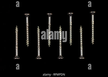 pattern of screws lying side by side Stock Photo - Alamy