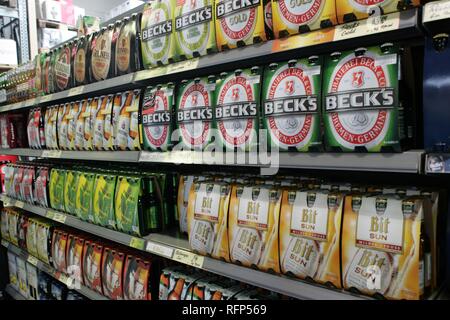 Six-packs of beer in a beverage store Stock Photo - Alamy