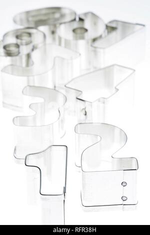Metal numbers, baking dishes Stock Photo - Alamy