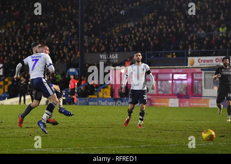 Bury's captain Nicky Adams scores his side's second goal of the game ...