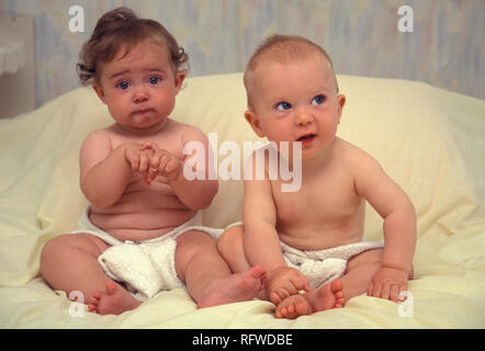 two babies fighting Stock Photo - Alamy