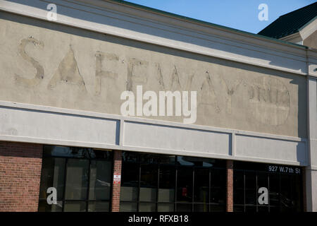 A logo sign outside of a Safeway grocery retail store location in Olney ...