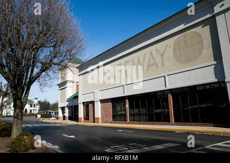 A logo sign outside of a Safeway grocery retail store location in Olney ...