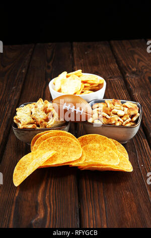 Concept of Super bowl snacks on gray wooden background Stock Photo - Alamy