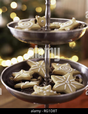 Christmas biscuits on a cake stand (close-up Stock Photo - Alamy