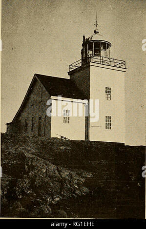 Lighthouses flashing light on sea Stock Photo - Alamy