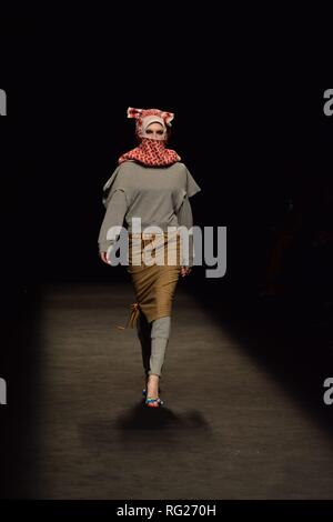 A model wears a creation by Roberto Diz during Fashion Week in Madrid ...