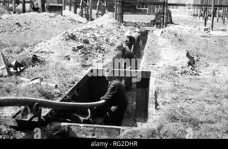 1937 Callender Cables laying High Voltage test cable at KEMA test ...