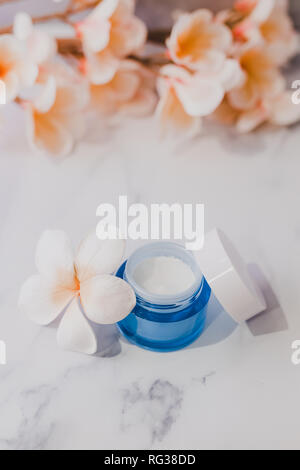 spa and skincare treatments concept, moisturiser scrub and hand cream ...