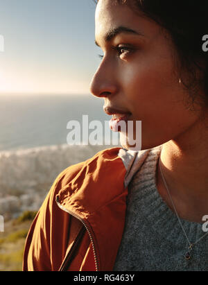 Side profile of a beautiful African woman face with Afro curly hair ...