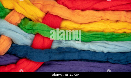 Tufts of hair of different colors twisted together form the colors of ...