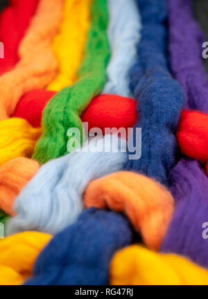 Tufts of hair of different colors twisted together form the colors of ...
